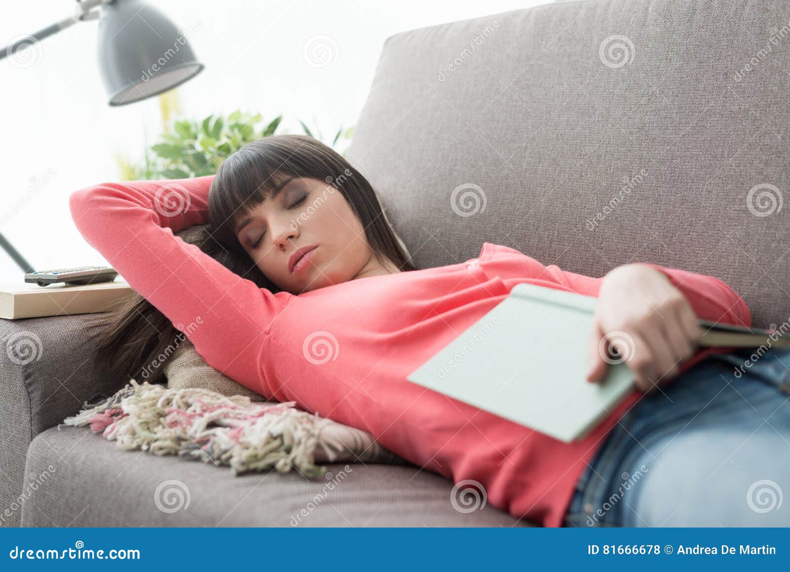 Woman napping on the sofa stock photo. Image of woman - 81666678