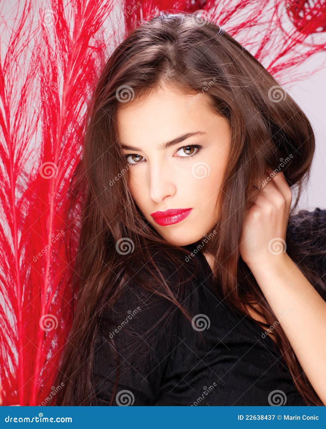 Woman near red feathers stock image. Image of vitality - 22638437