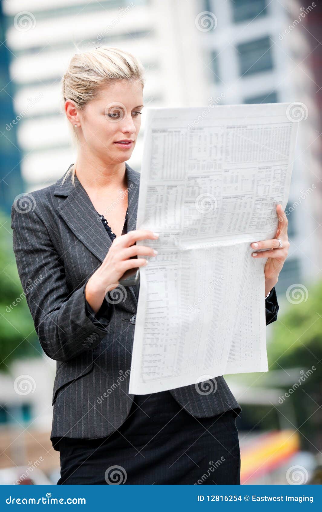 Woman with Newspapers stock photo. Image of smiling, outside - 12816254