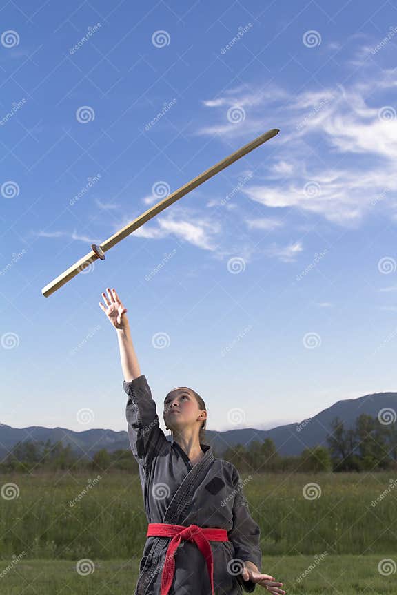 Woman ninja throwing sword stock photo. Image of agility - 24879606