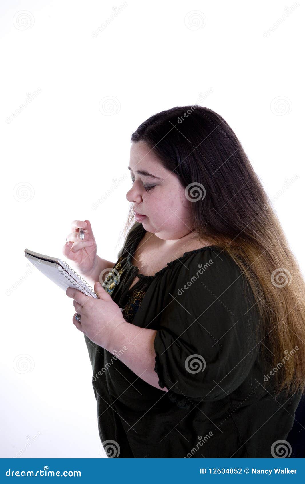 Woman with Notebook stock photo. Image of writing, casual - 12604852