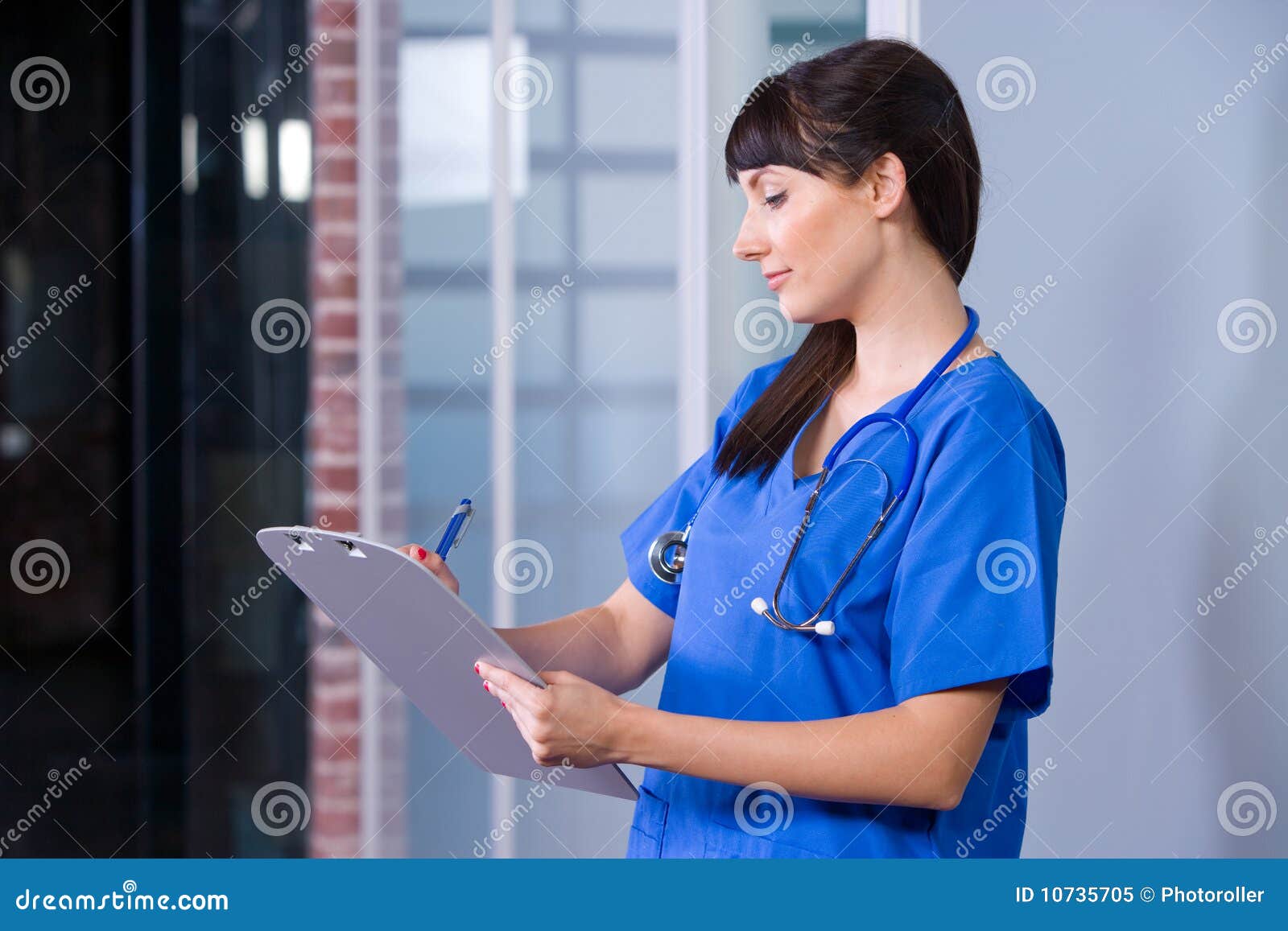Woman Nurse chart stock image. Image of hospital, looking - 10735705