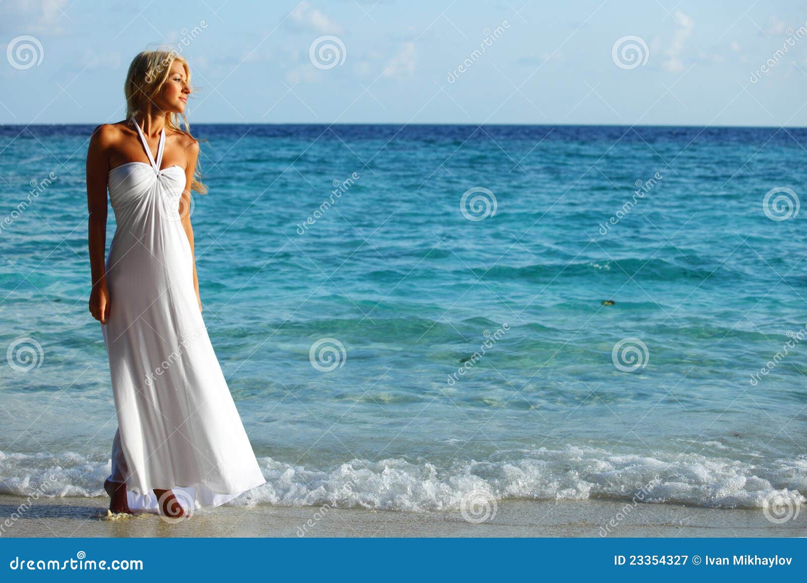 Woman on the ocean coast stock image. Image of person - 23354327