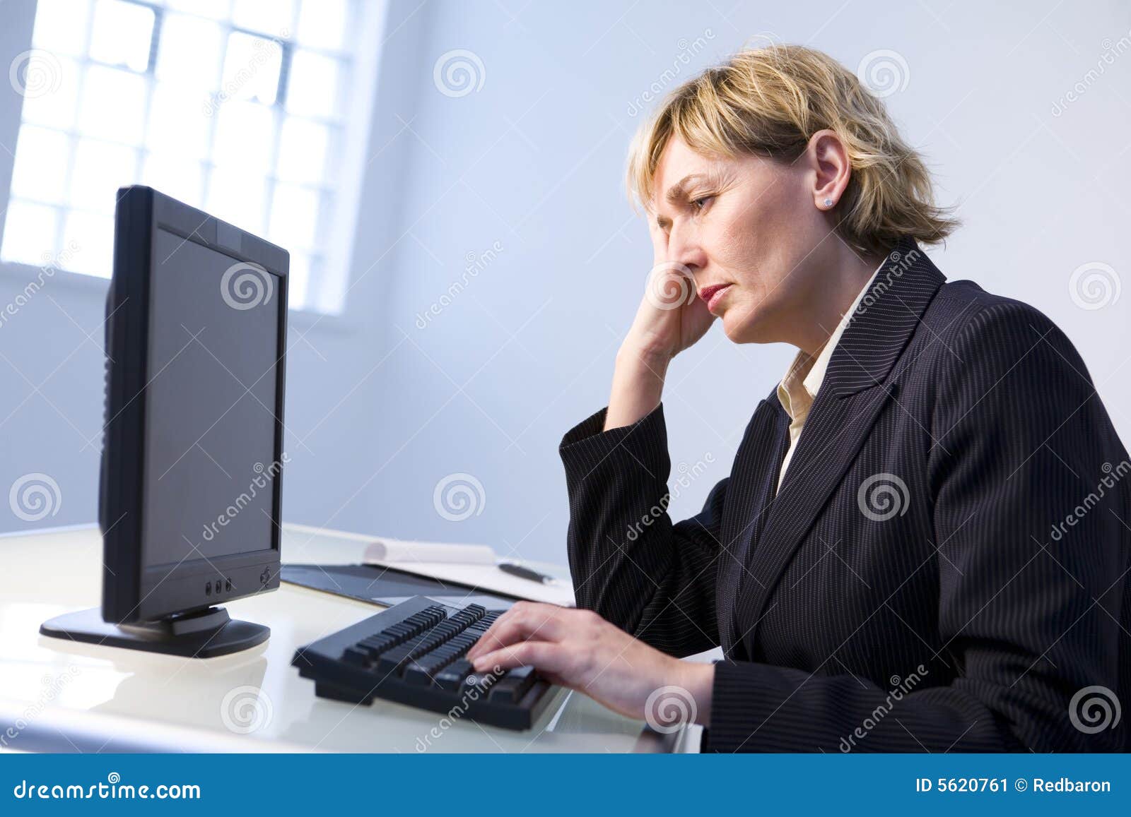 Woman in Office on Computer Stock Image - Image of boss, suit: 5620761