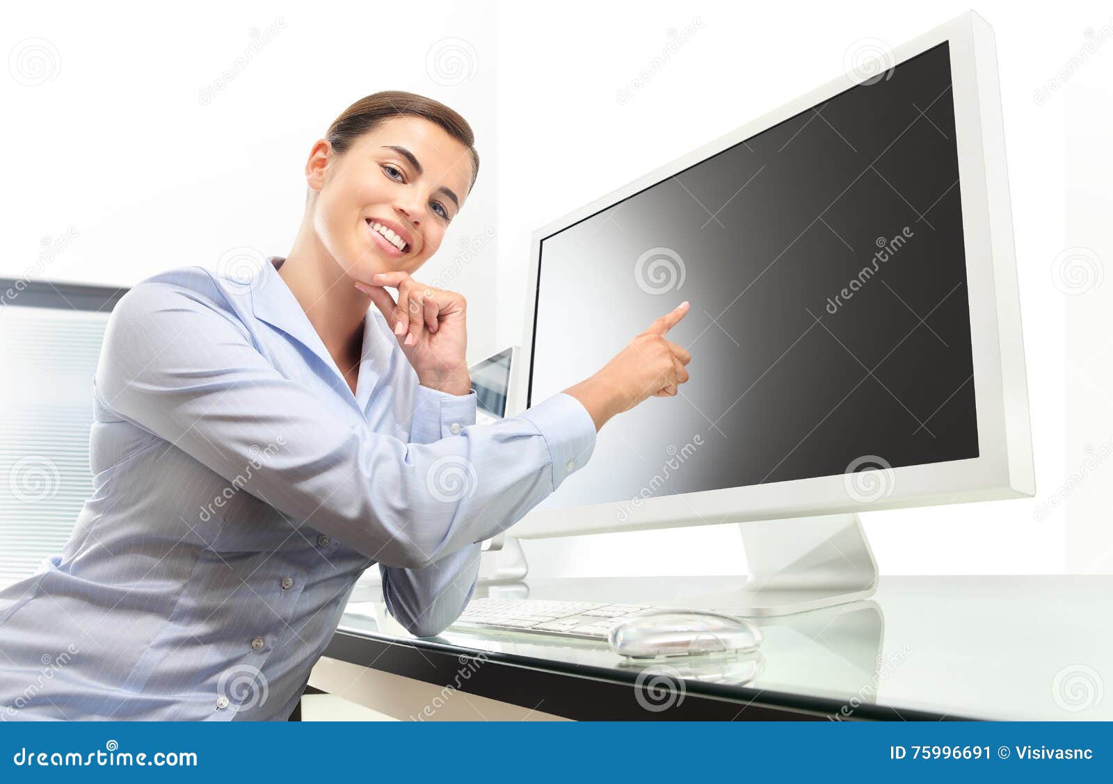 Woman in Office at Desk in Front of Computer Pointing Screen Stock ...