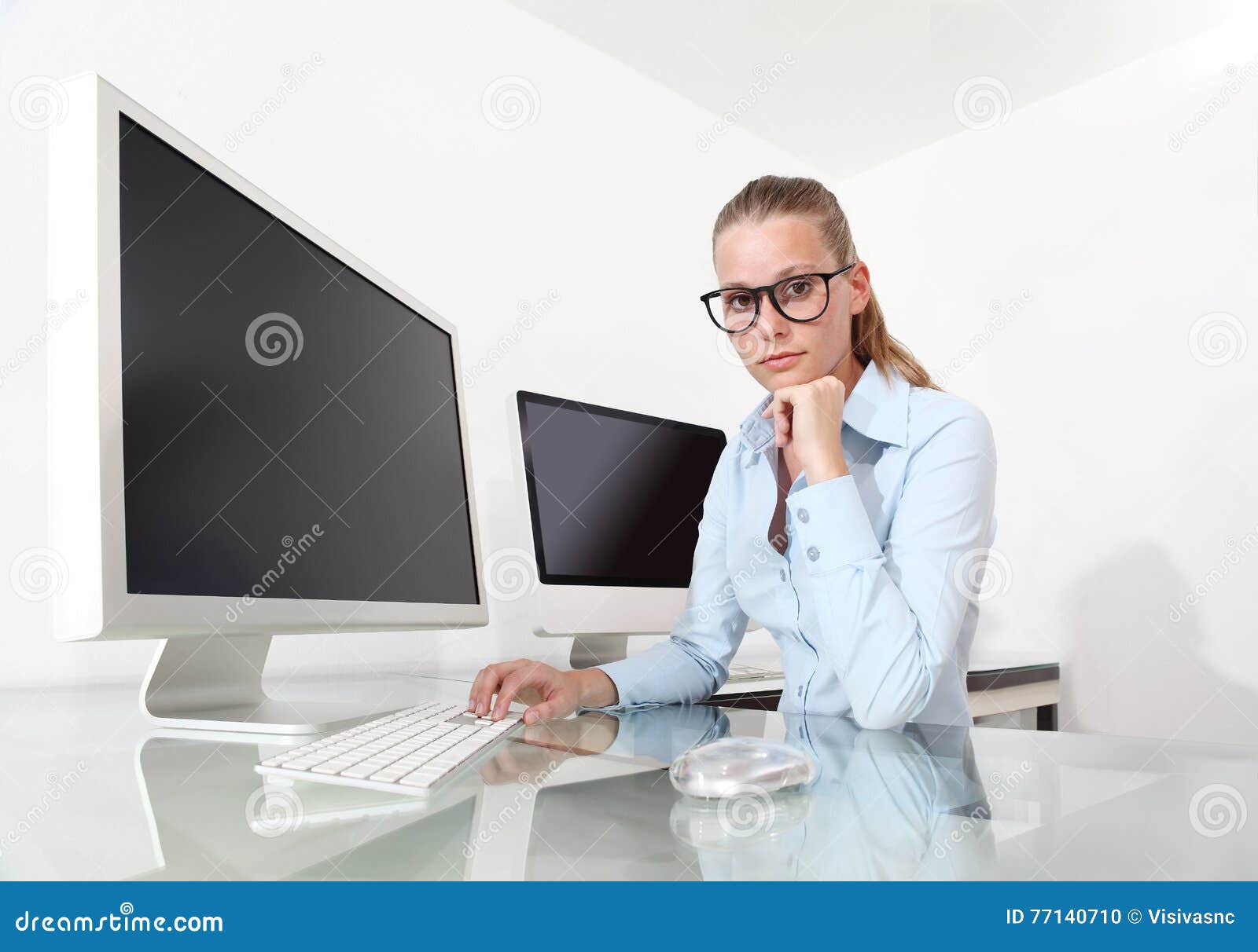 Woman in Office at Desk in Front of Computer Stock Photo - Image of ...