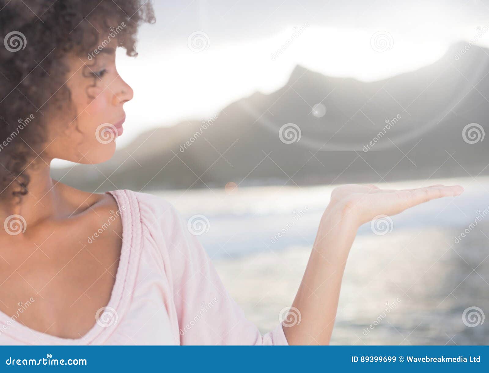 Woman with Open Palm Hand in Front of Sea and Mountains Stock Image ...