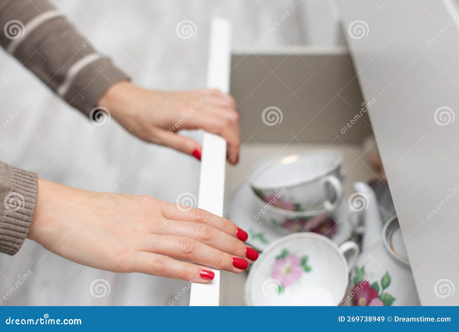 Woman Opening a Drawer with Tea Utensils Stock Image - Image of kitchen ...