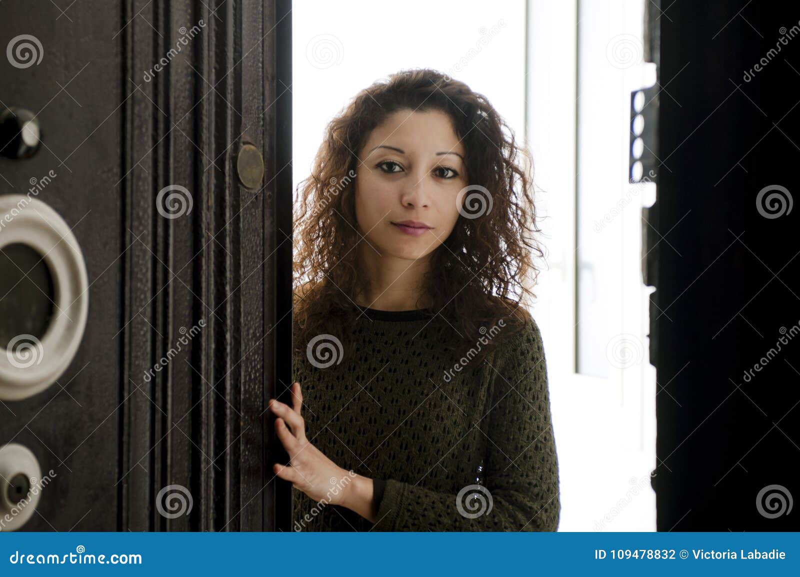 Woman Opening the Front Door Stock Photo - Image of white, beautiful ...