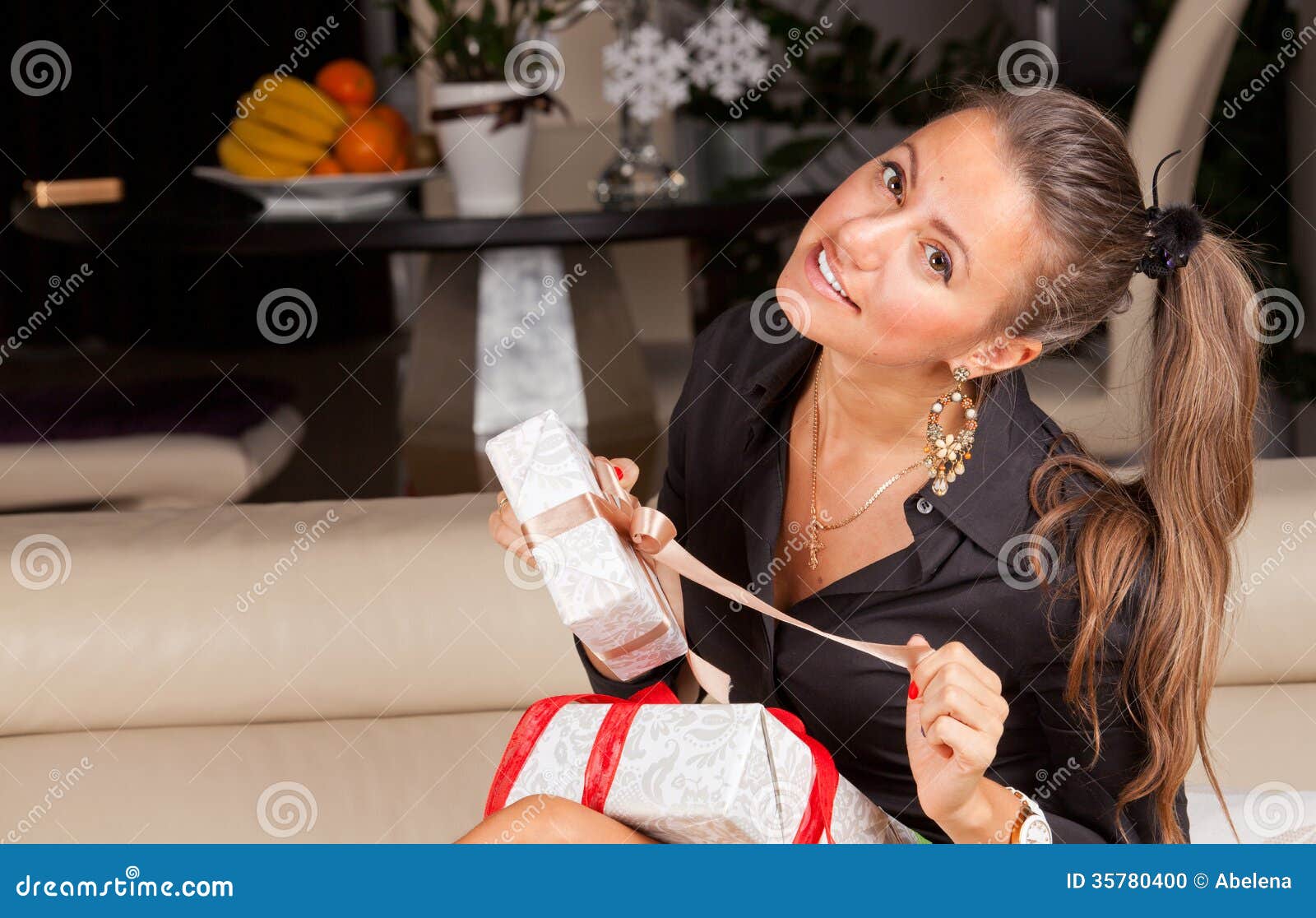 Woman opening gift box stock photo. Image of beautiful - 35780400