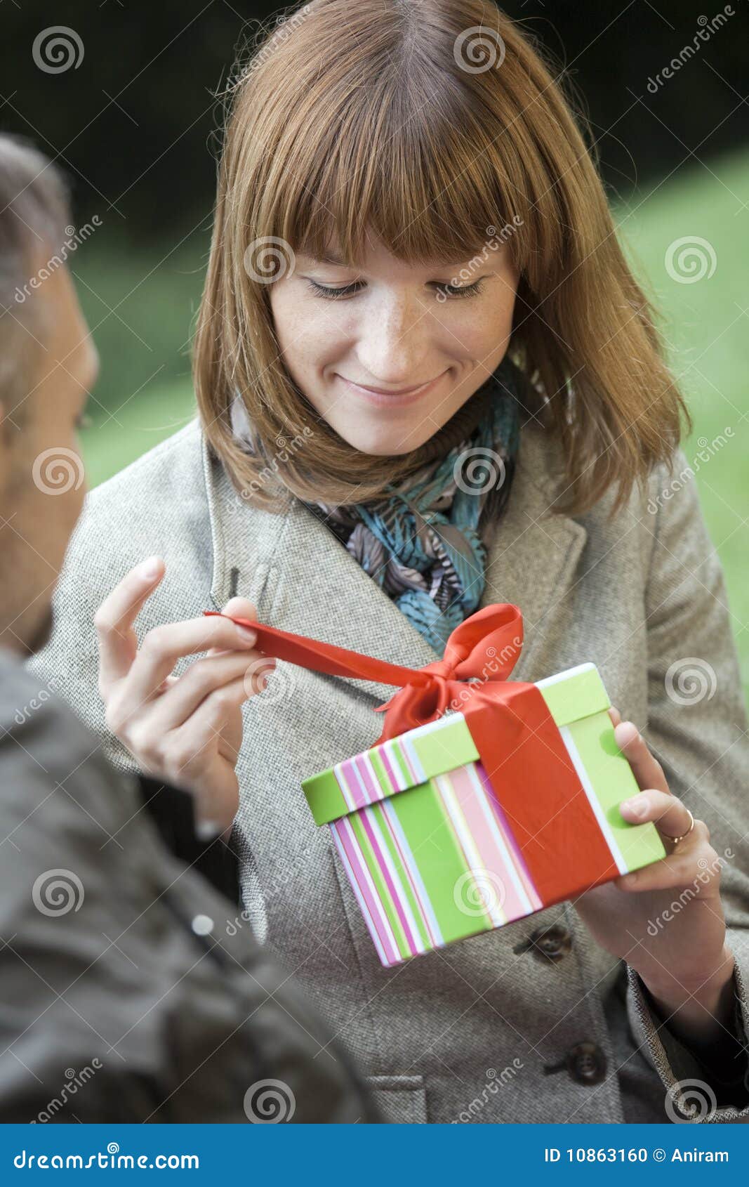 Woman Opening Gift Box Outdoors Stock Photo - Image of celebrating ...
