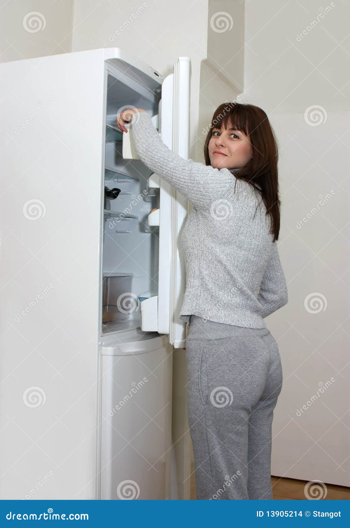 A Woman Opening a Refrigerator Stock Photo - Image of gray, young: 13905214