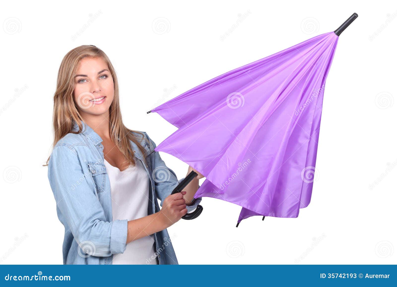 Woman opening an umbrella stock image. Image of blue - 35742193
