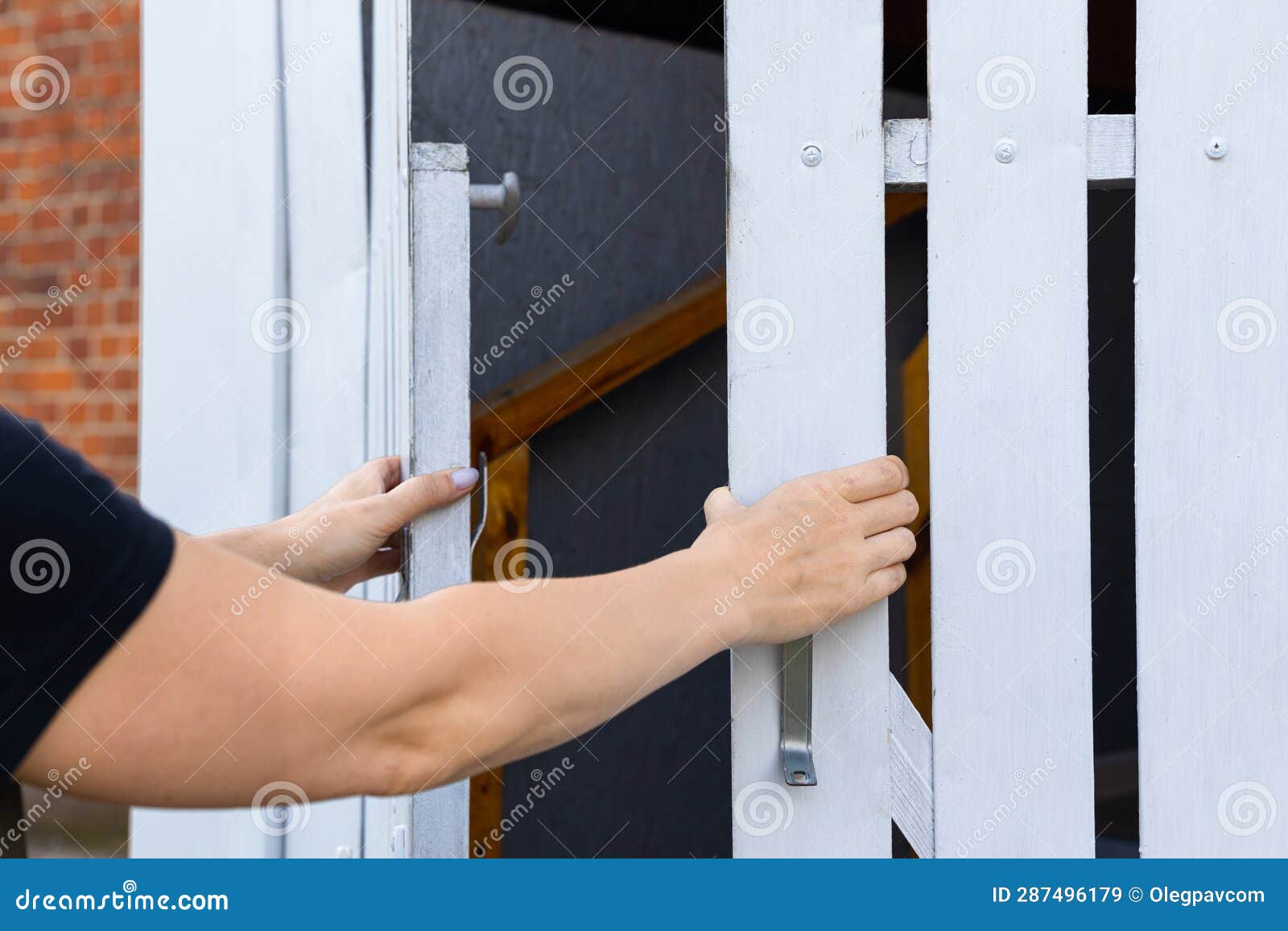 Woman Opens Double Doors with Two Hands Stock Image - Image of ...