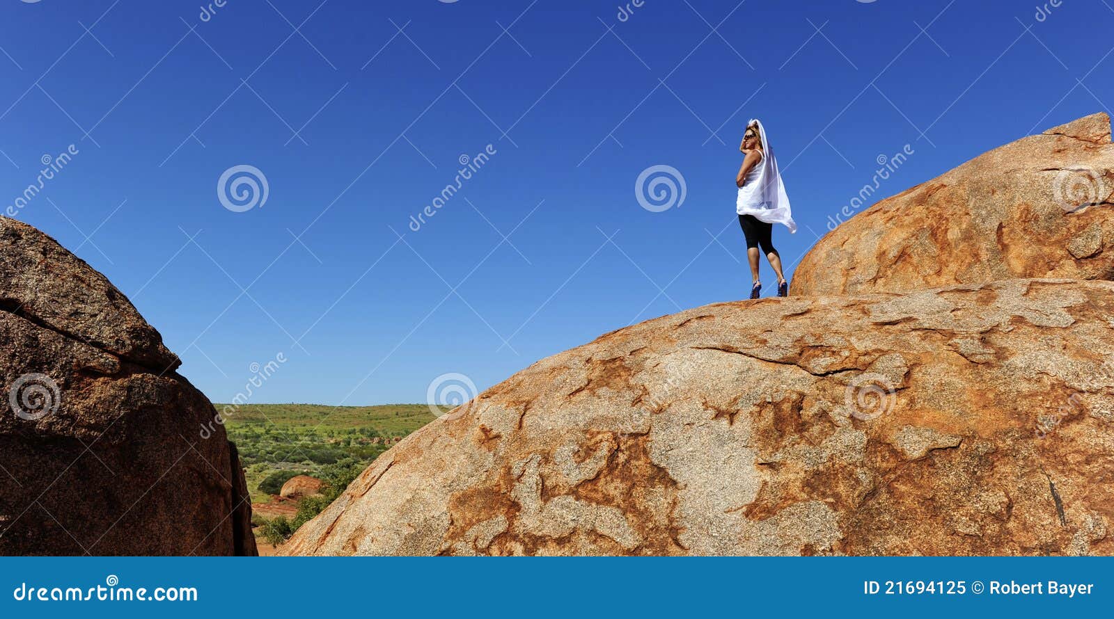 Woman on Outback Rock stock image. Image of attitude - 21694125
