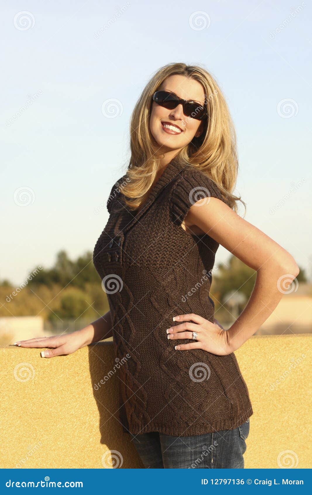 Woman outside 021510 stock photo. Image of sweater, sunglasses - 12797136