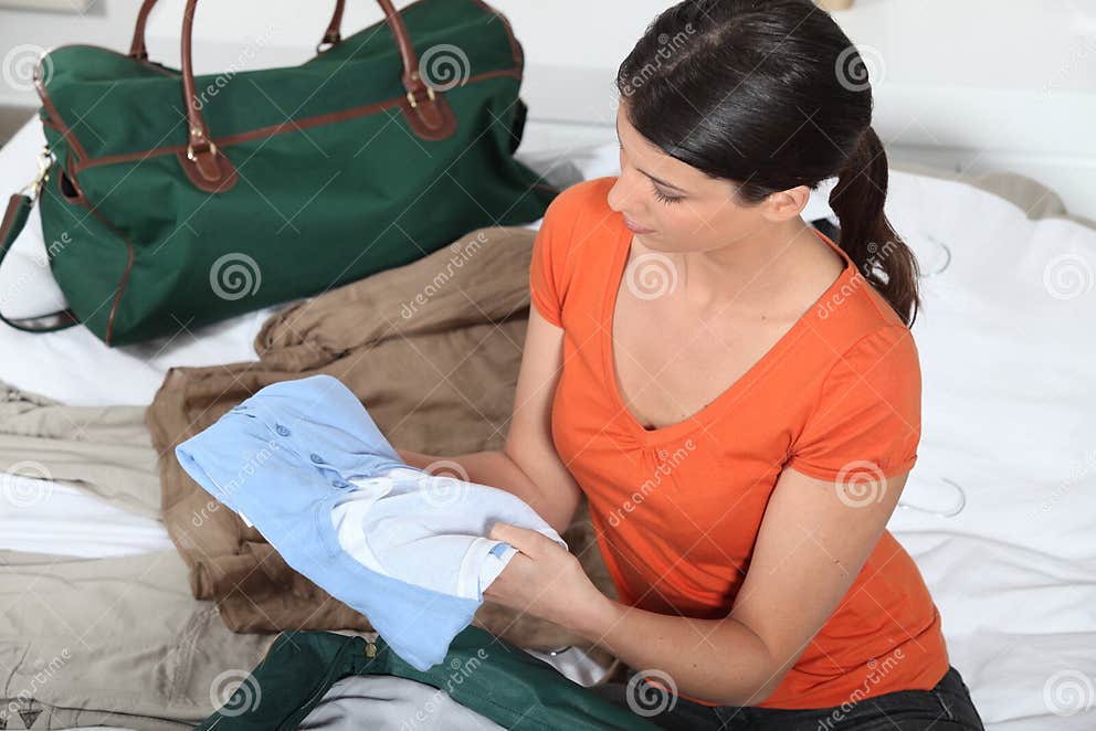Woman packing a bag stock photo. Image of full, beautiful - 22485126