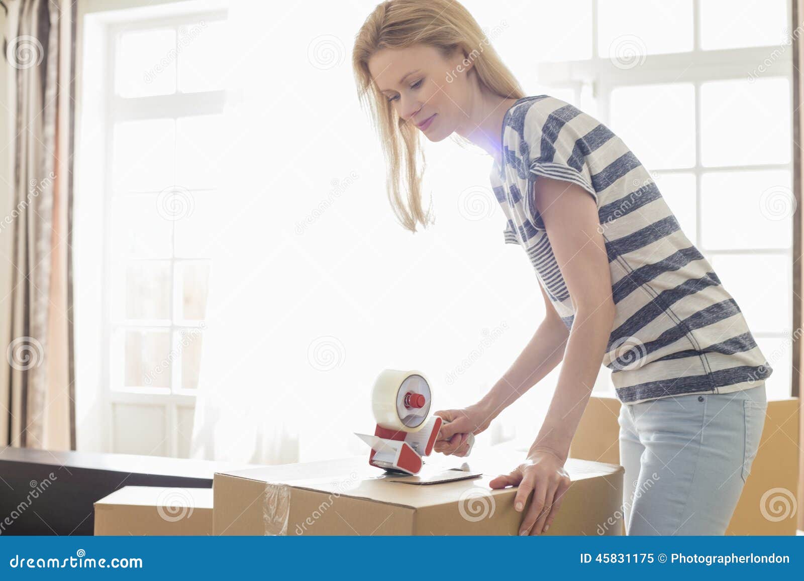 Woman Packing Moving Box at Home Stock Image - Image of owner, house ...