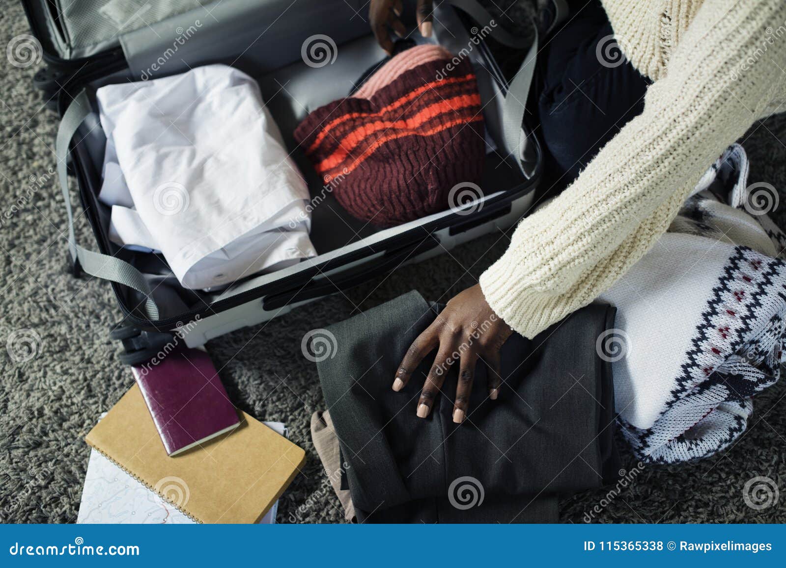 Woman packing for a trip stock photo. Image of explore - 115365338