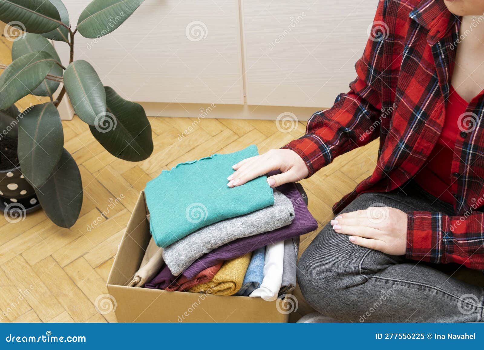 Woman Packs Clothes in Boxes for Donating. Stock Image - Image of pack ...