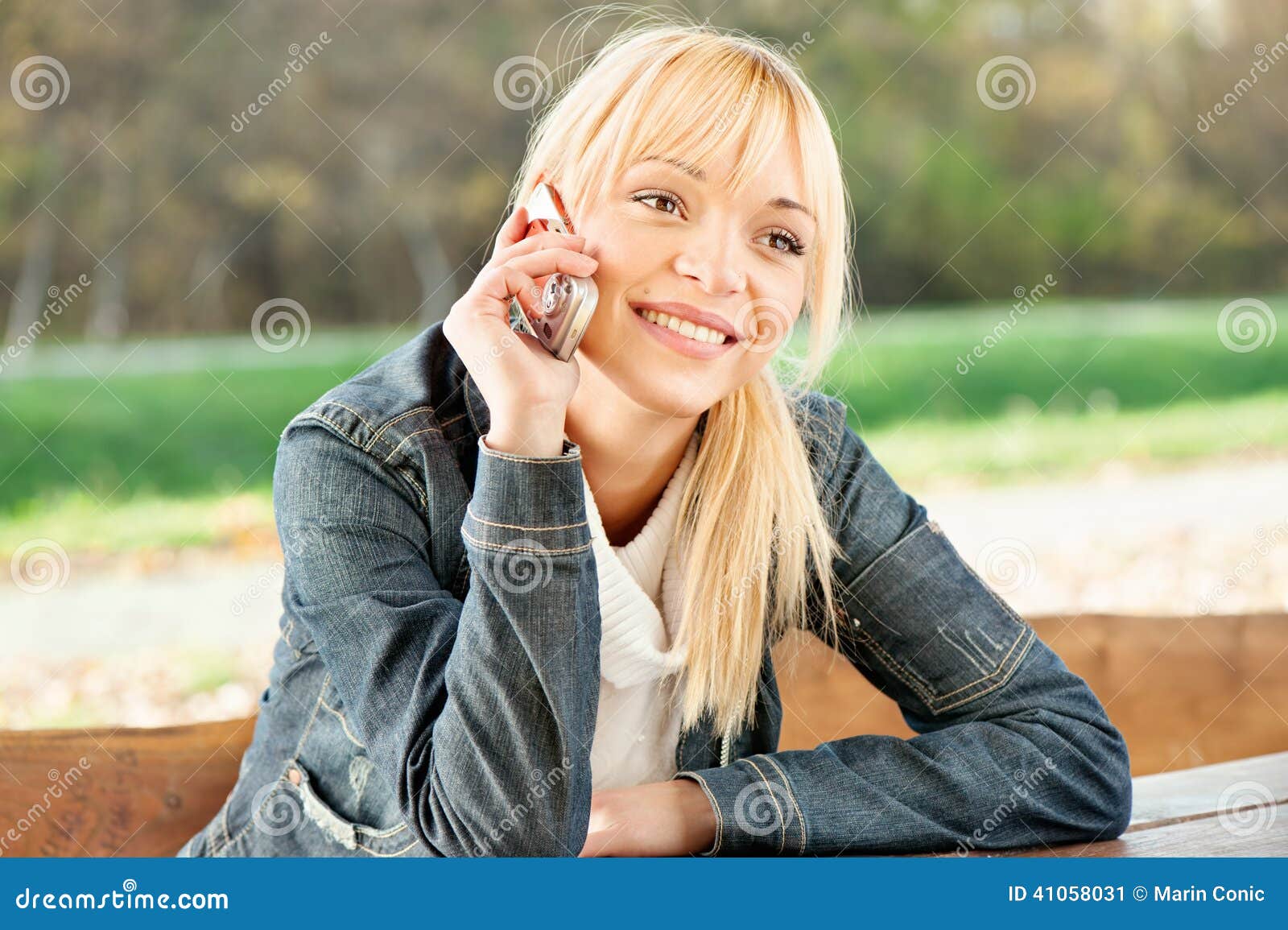 Woman at Park Taking a Phone Call Stock Image - Image of call, young ...