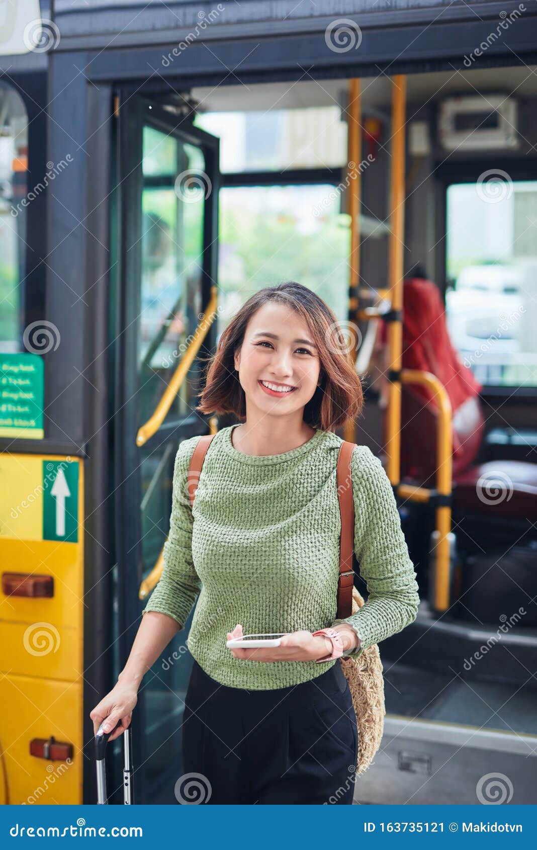 Woman Passenger with Backbag Getting Off the Bus in Vacation Stock ...