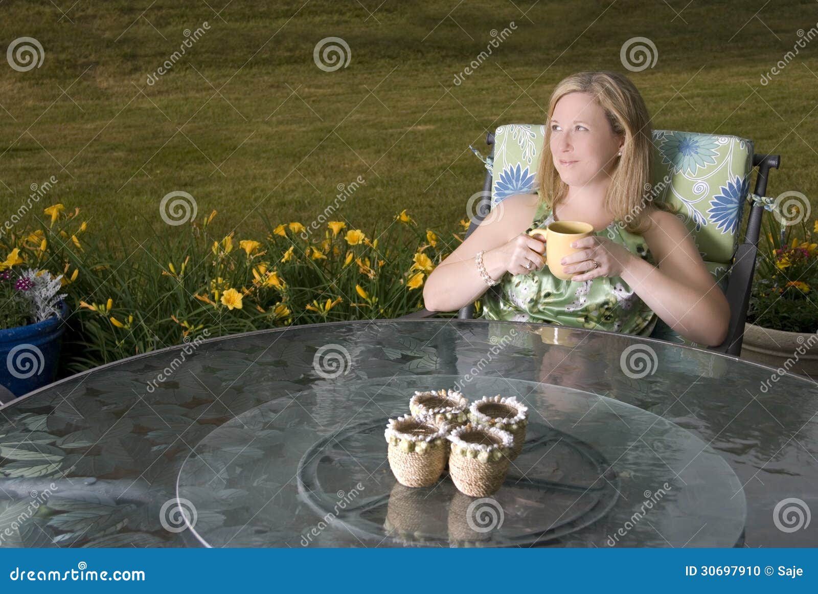 Woman on Patio with Coffee stock photo. Image of drinking - 30697910