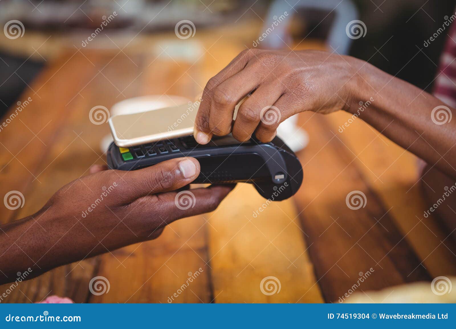 Woman Paying Bill through Smartphone Using Nfc Technology Stock Photo ...