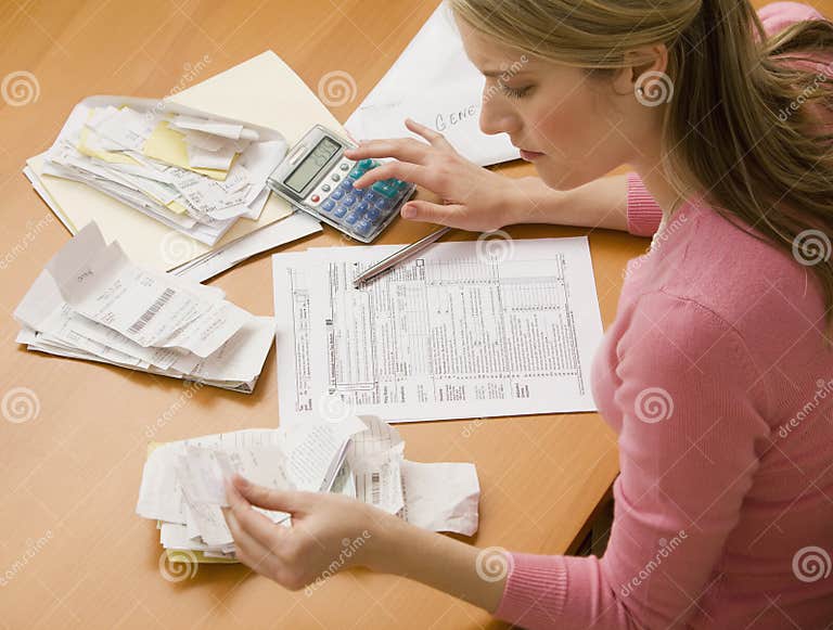 Woman Paying Bills stock photo. Image of caucasian, indoors - 14647126