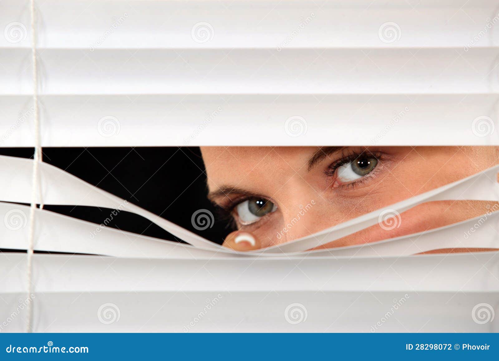 Woman Peeking Through Blinds Stock Photography - Image: 28298072