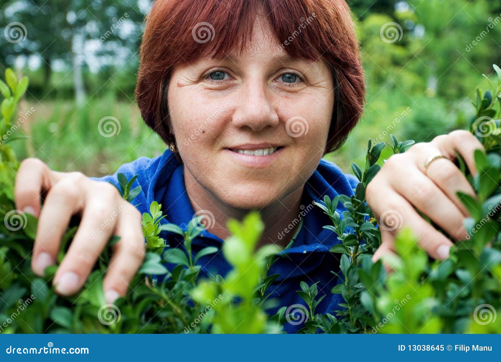 Woman Peeking through Green Leafs Stock Image - Image of nature ...
