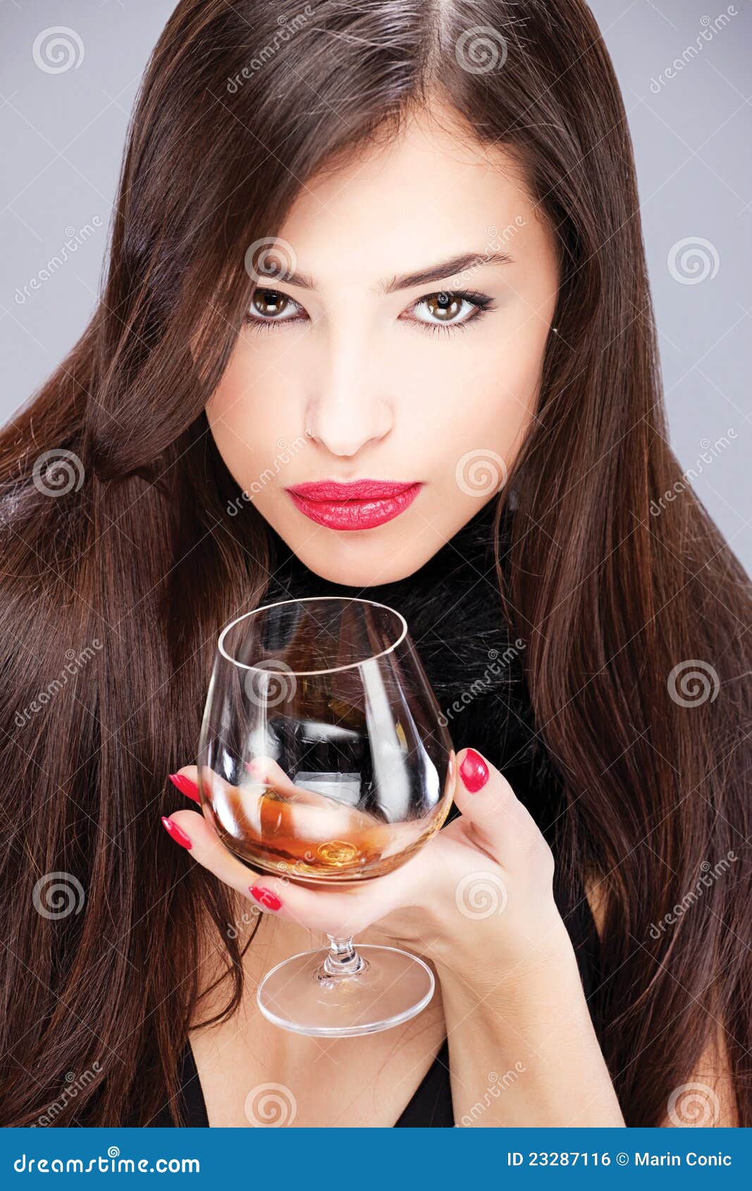 Woman with Pelt Holding Glass of Brandy Stock Photo - Image of lady ...