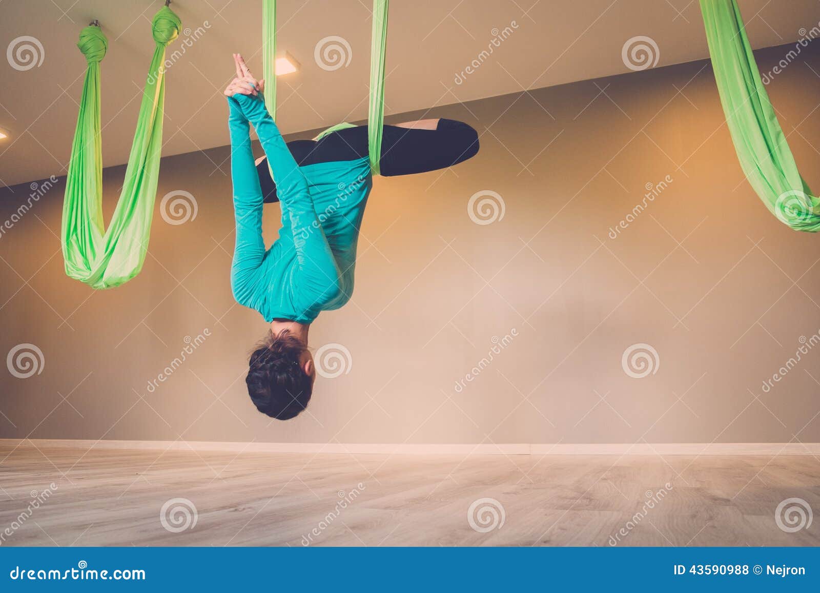 Woman Performing Antigravity Yoga Stock Photo - Image of girl, asanas ...