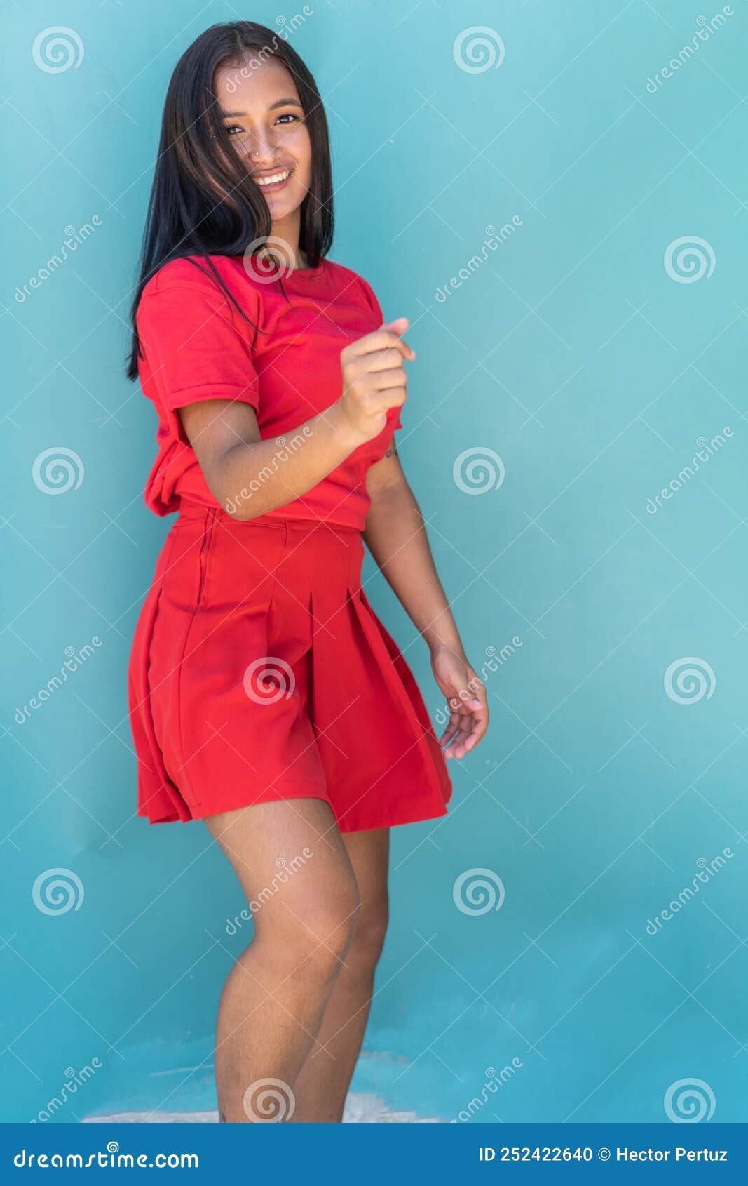 Woman Performing Dancing Movements, Looking at Camera Stock Photo ...
