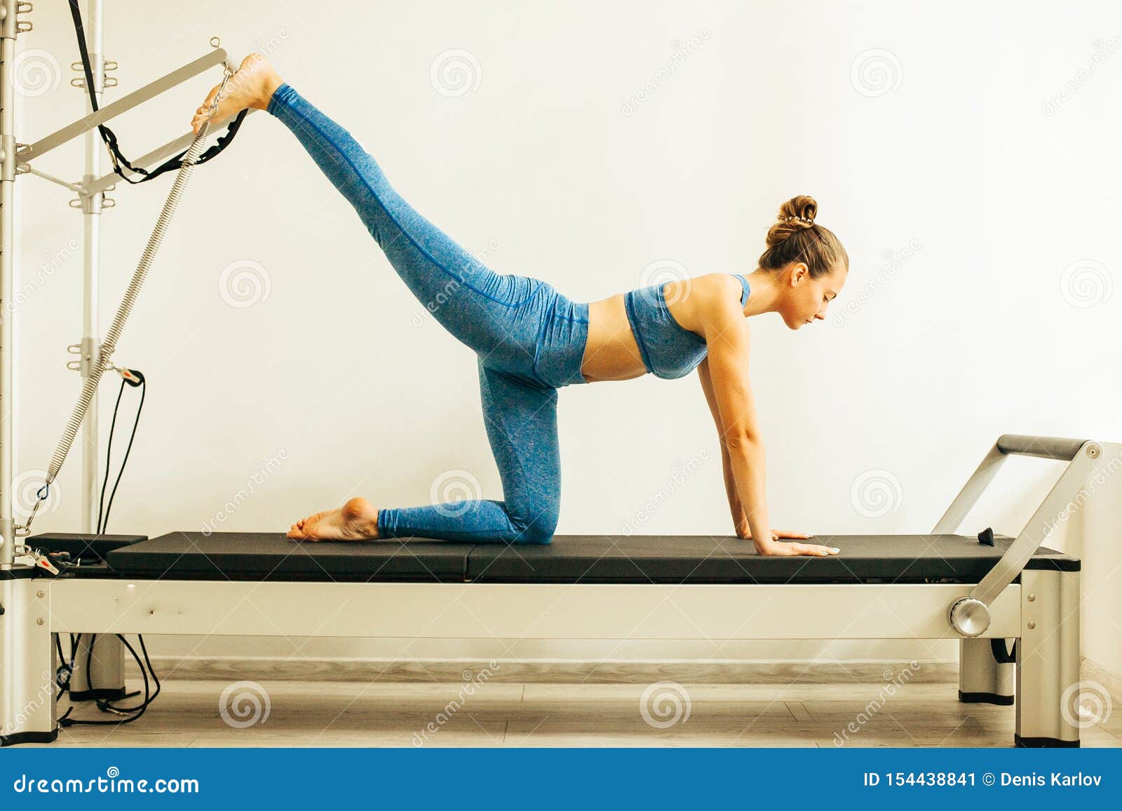 Woman Performing Pilates Exercise Stock Image - Image of core ...
