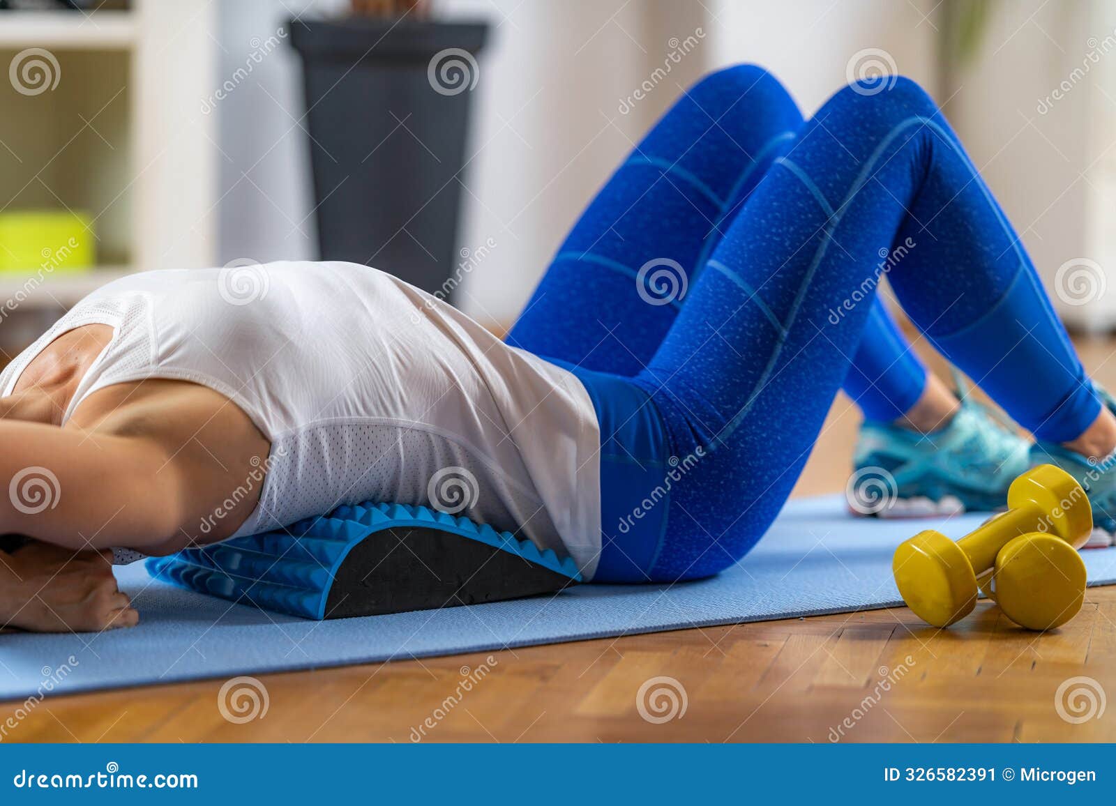 Woman Performs Back Reliever Stretches at Home, Targeting Back Pain ...