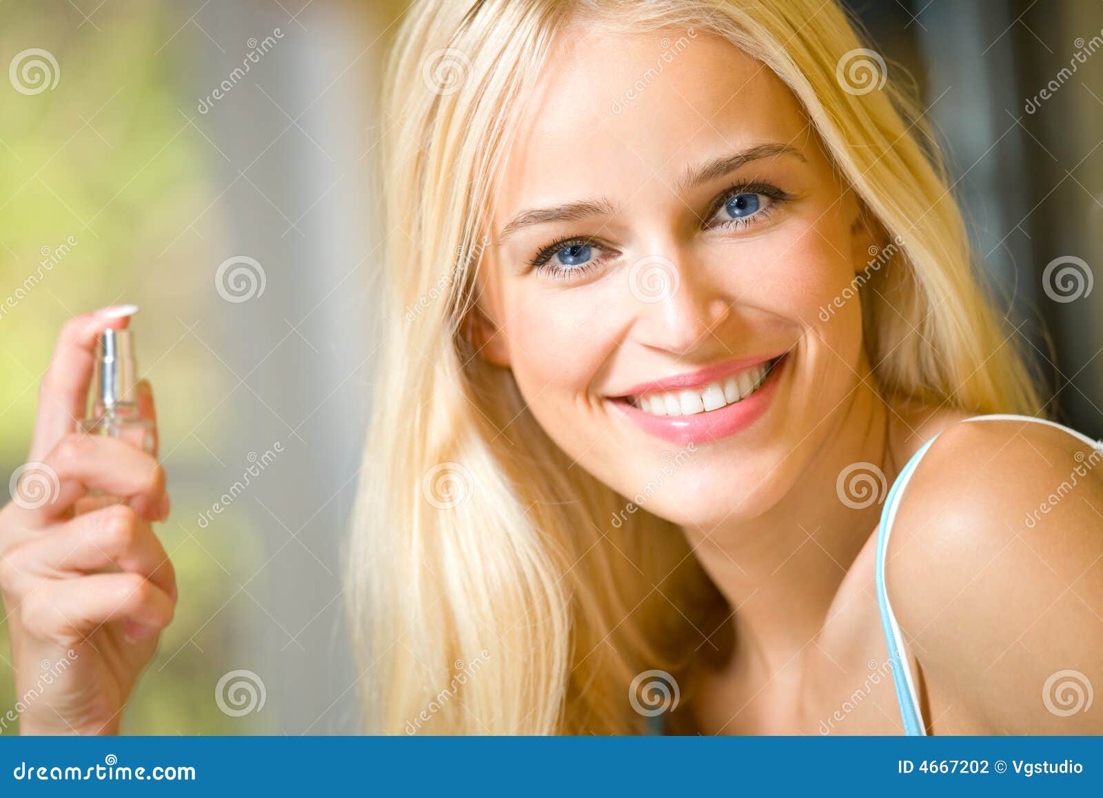 Woman with perfume bottle stock photo. Image of bottle - 4667202