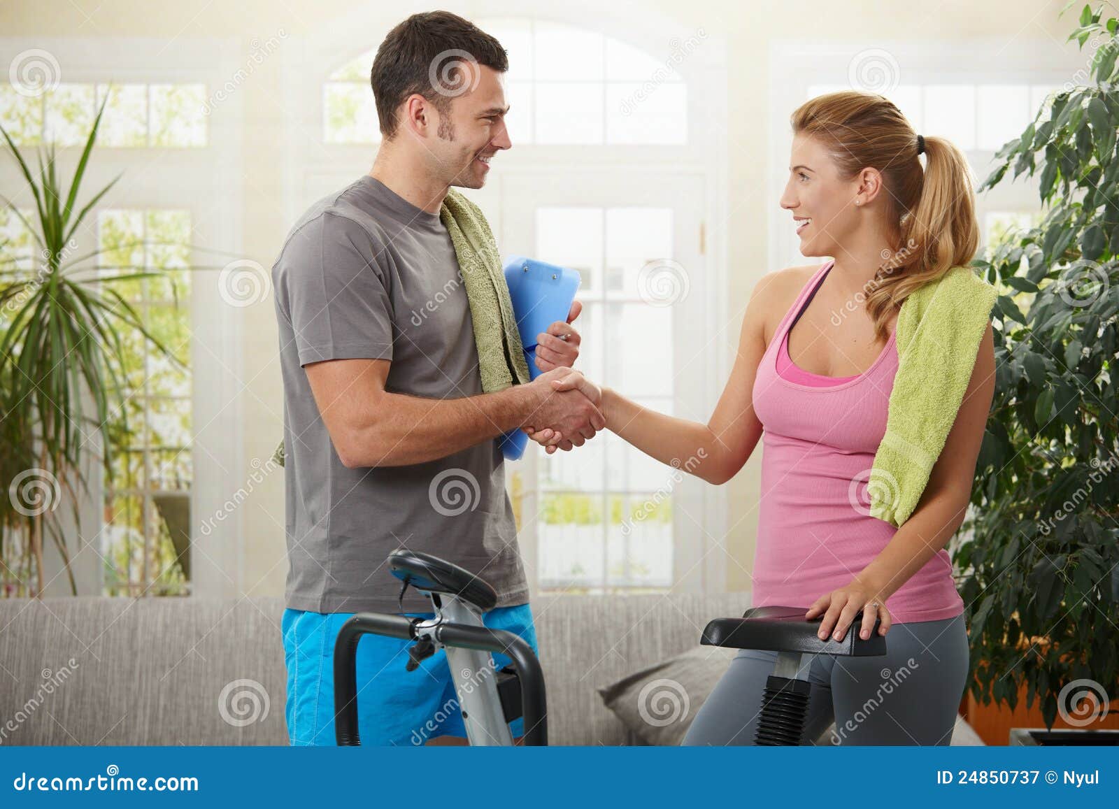 Woman with Personal Trainer Stock Image - Image of alone, adult: 24850737