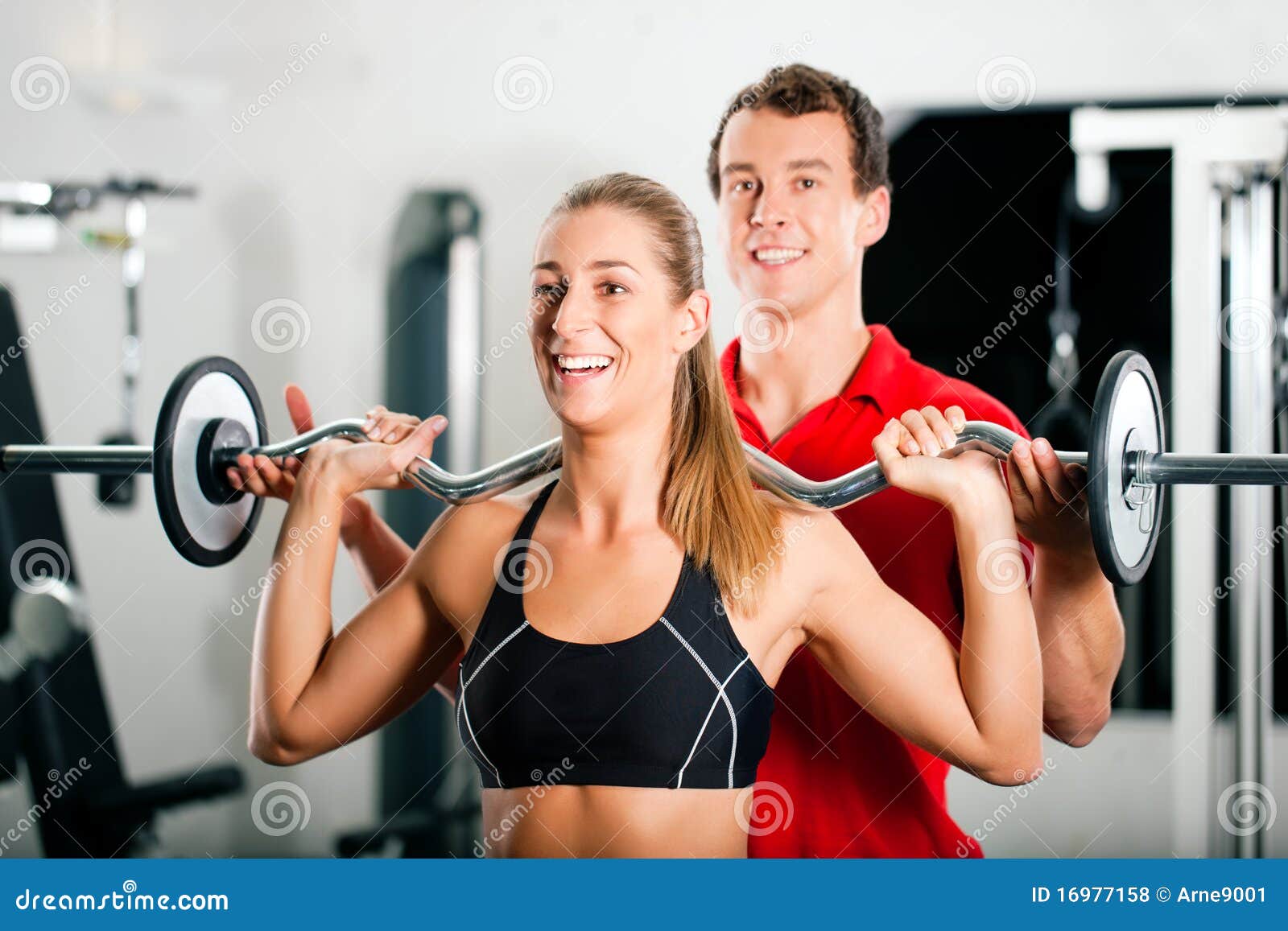 Woman with Personal Trainer in Gym Stock Photo - Image of building ...