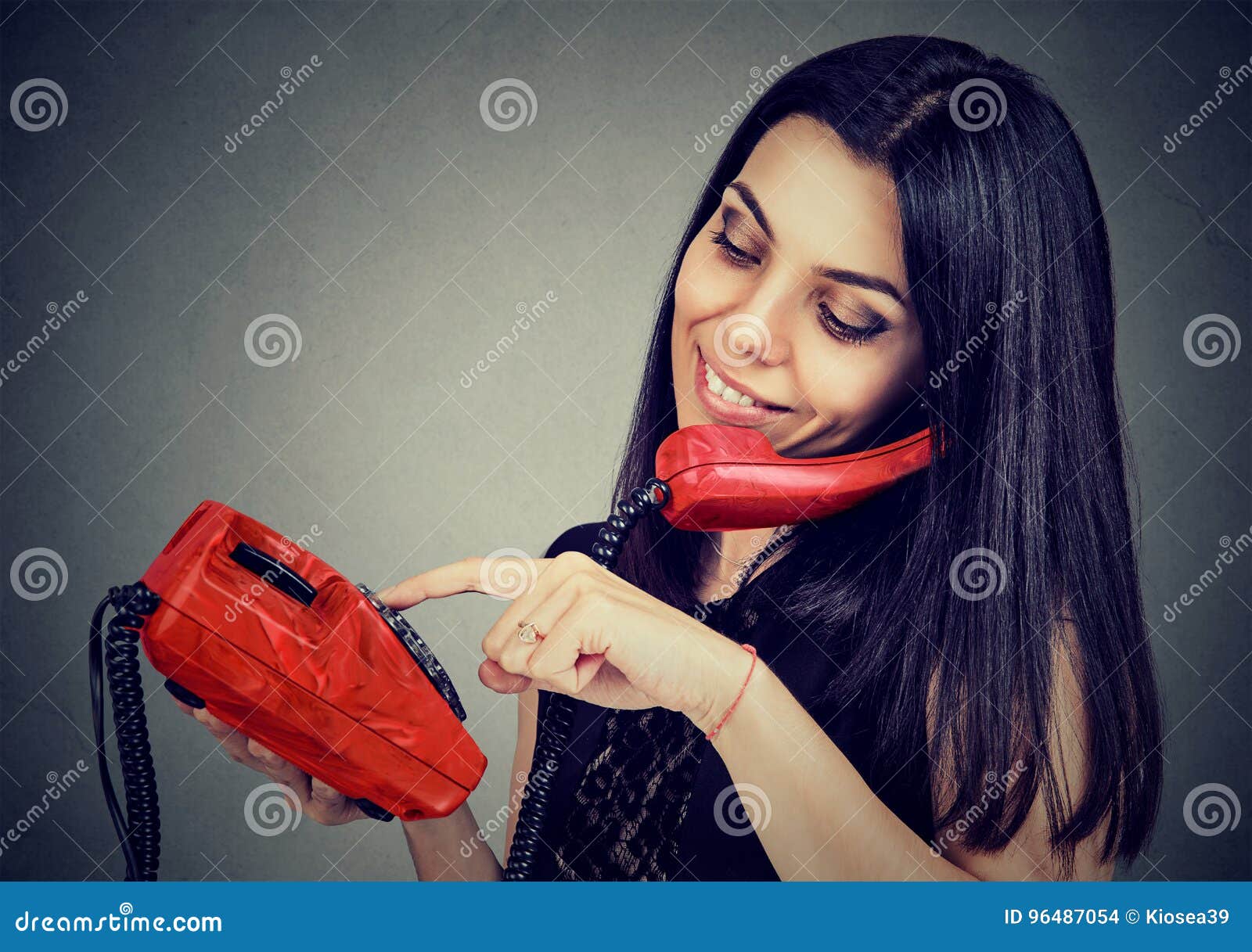 Woman on the Phone Dialing the Number Stock Photo - Image of phone ...