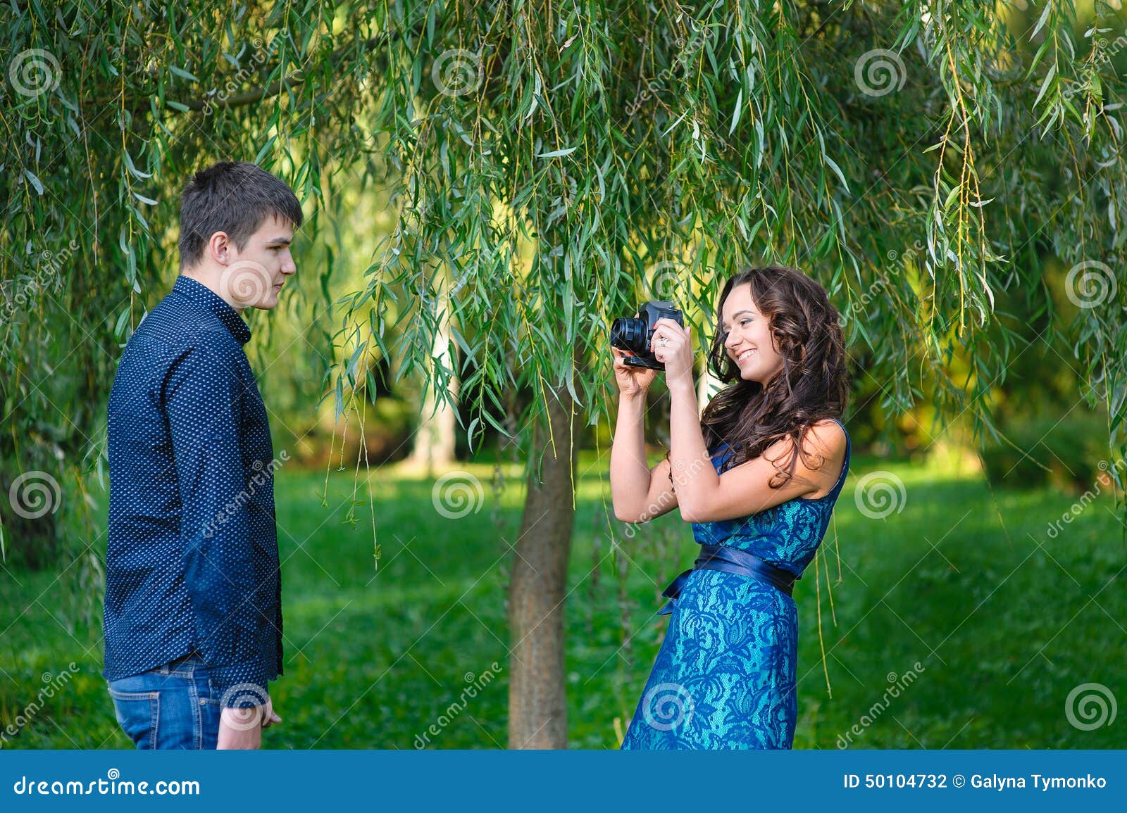 Woman Photographing a Man on Camera Stock Photo - Image of female ...