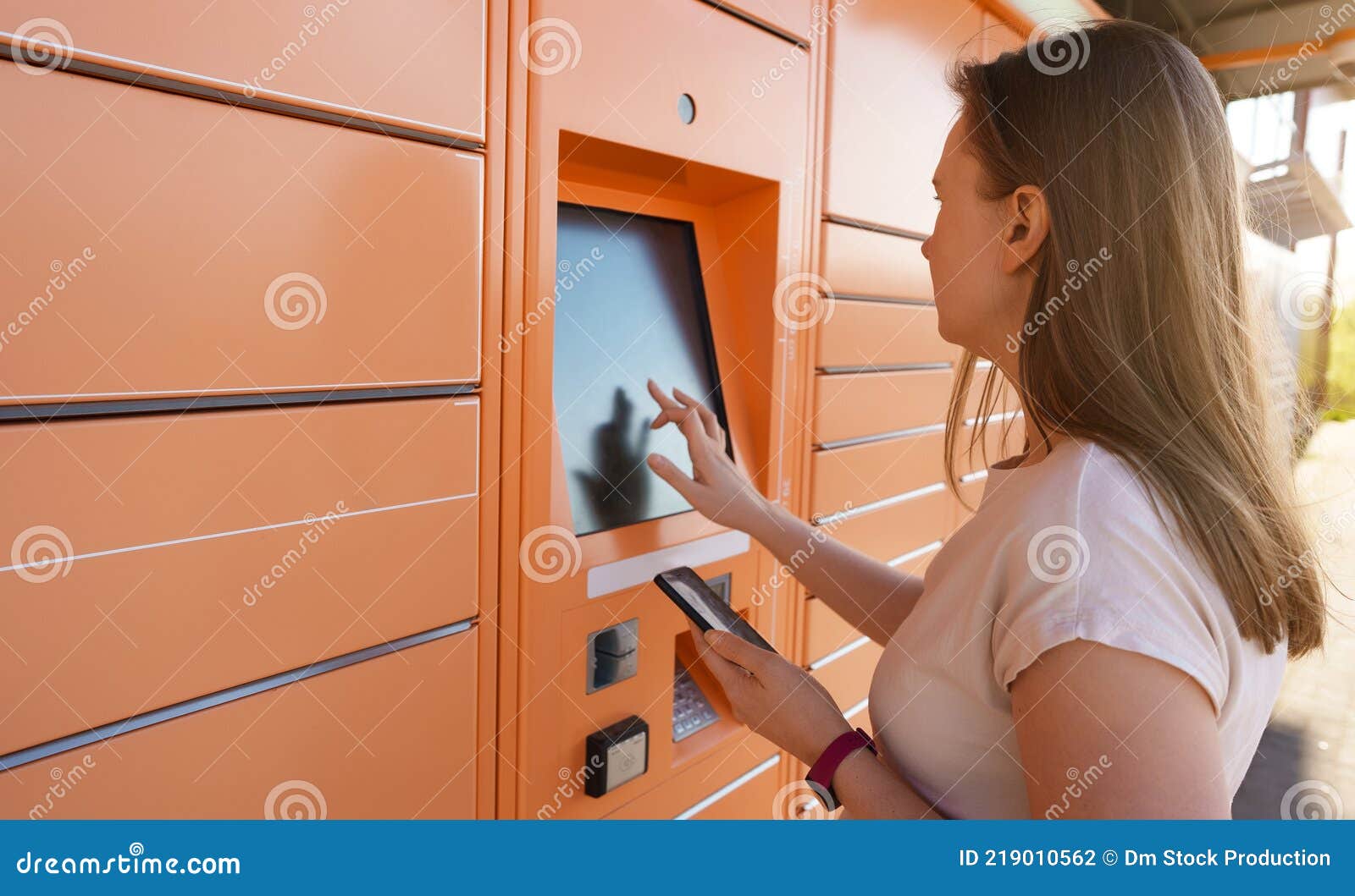 Woman picks up mail stock photo. Image of automat, locker - 219010562