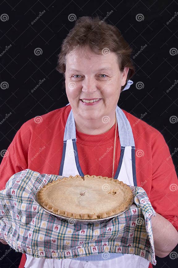 Woman with pie stock photo. Image of happy, housewife, cooking - 694104