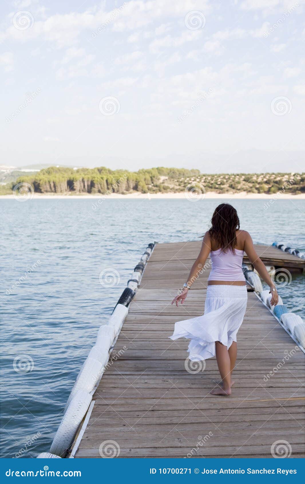 Woman on pier stock image. Image of barefoot, bare, calmness - 10700271