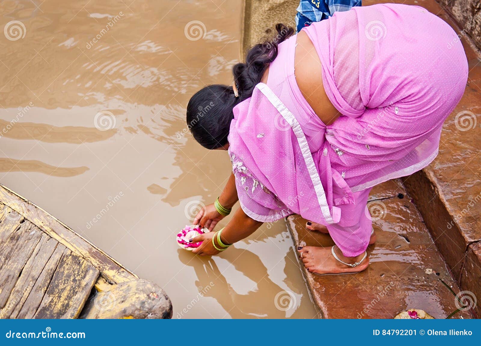 Woman Pilgrim Is Praying In Prison Of Jesus Christ. Stock Photo ...