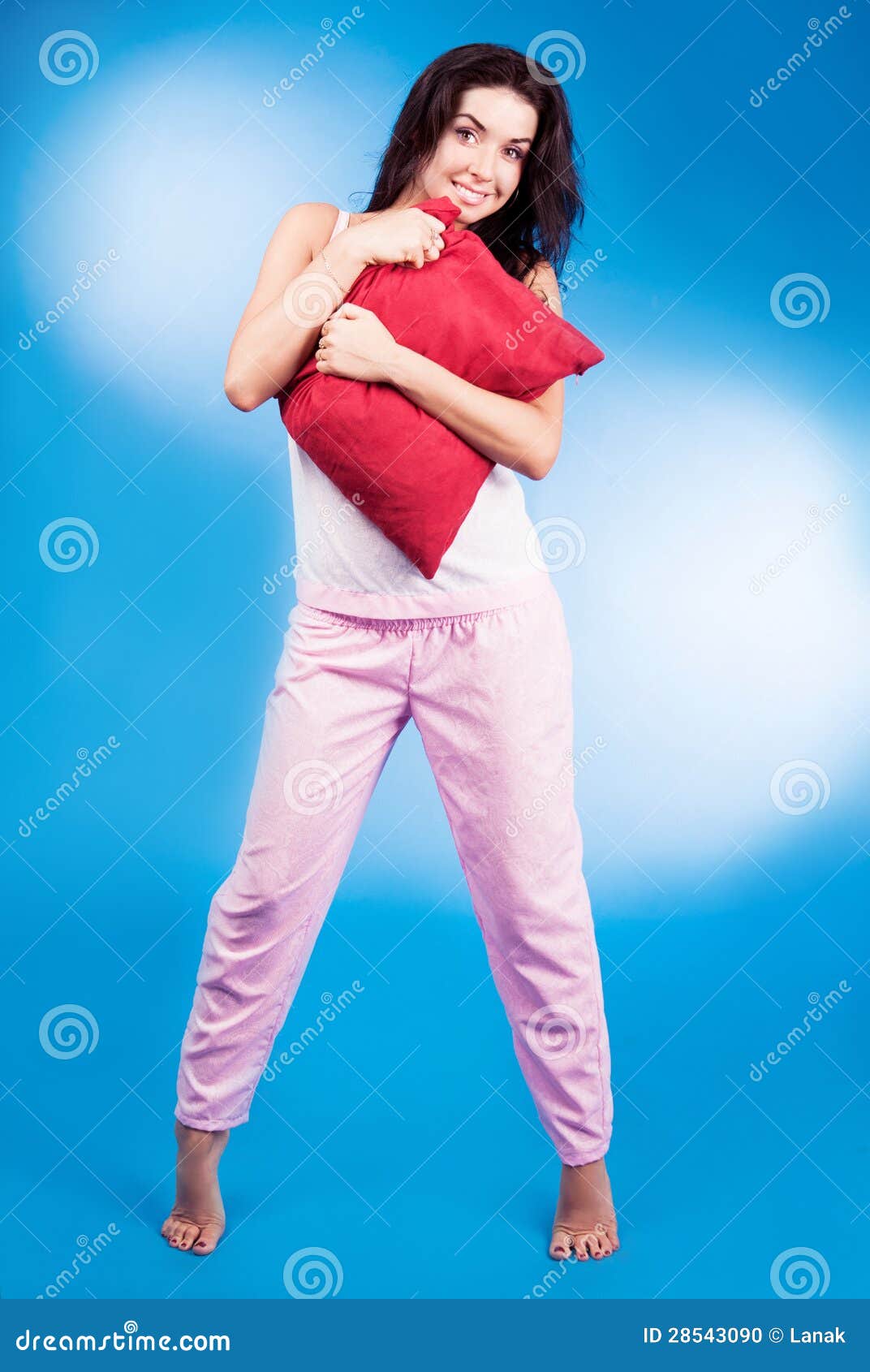 Woman with pillow stock photo. Image of brunette, model - 28543090