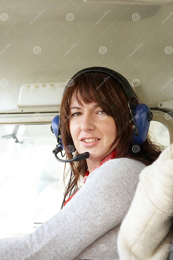 Woman pilot in plane stock image. Image of airplane, casual - 13163487