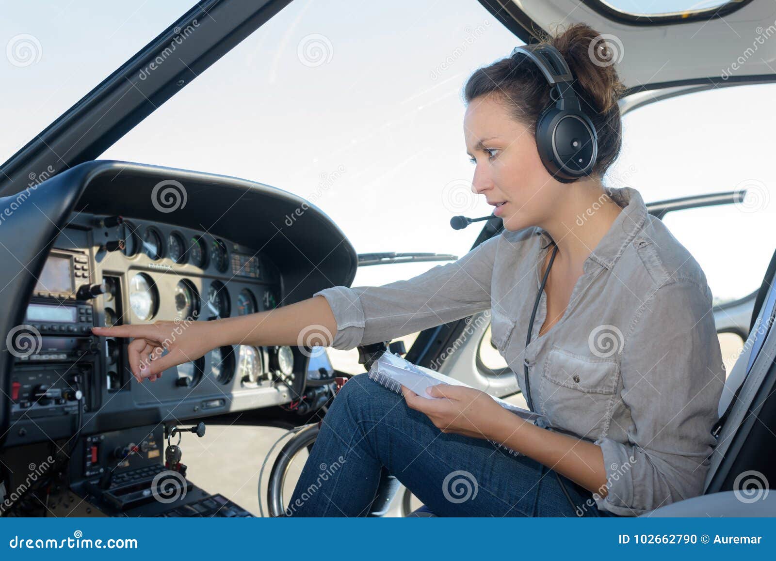 Woman Pilots Flying Helicopter Stock Photo - Image of panel, girl ...
