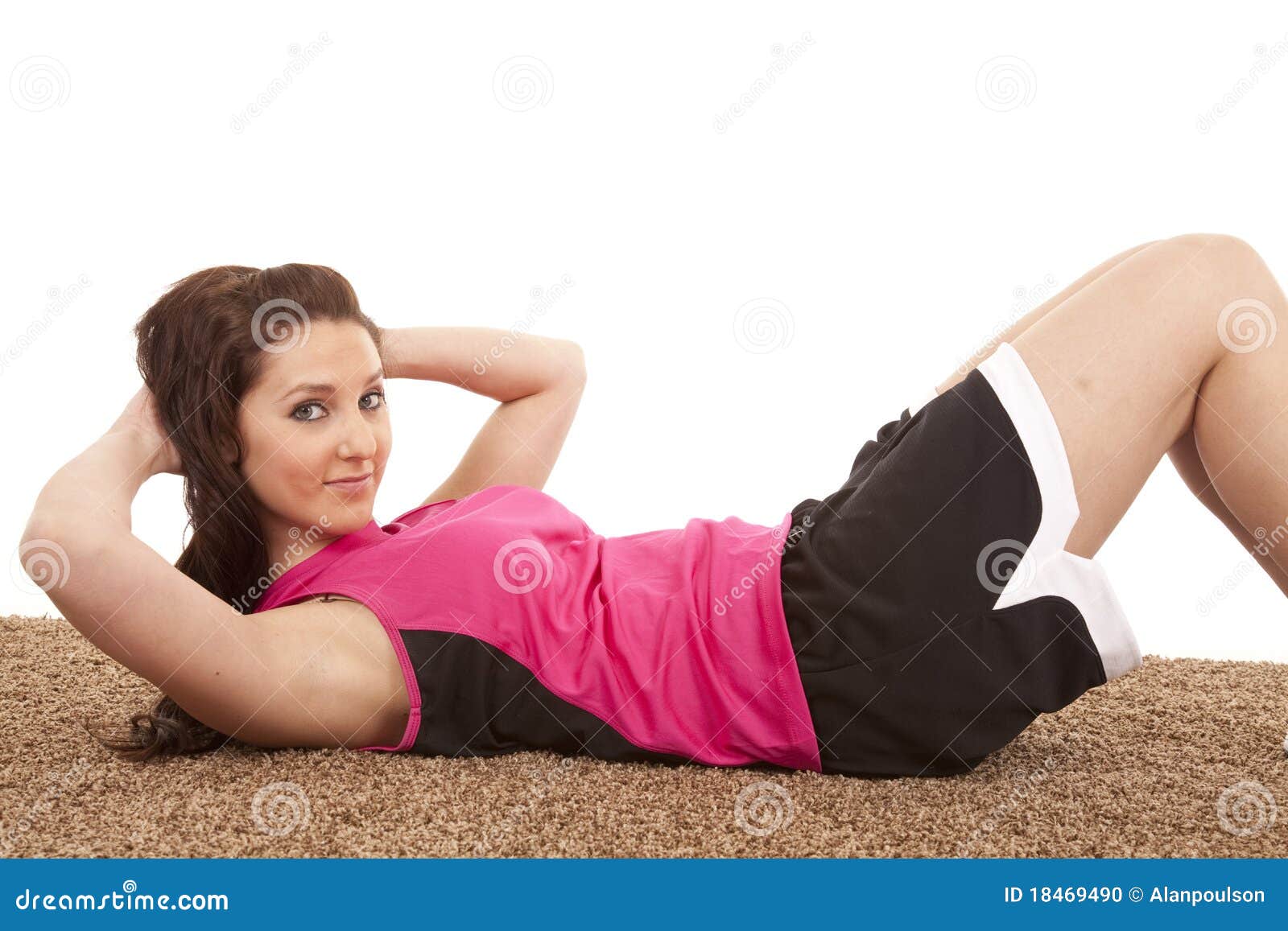 Woman in pink doing crunch stock photo. Image of beautiful - 18469490