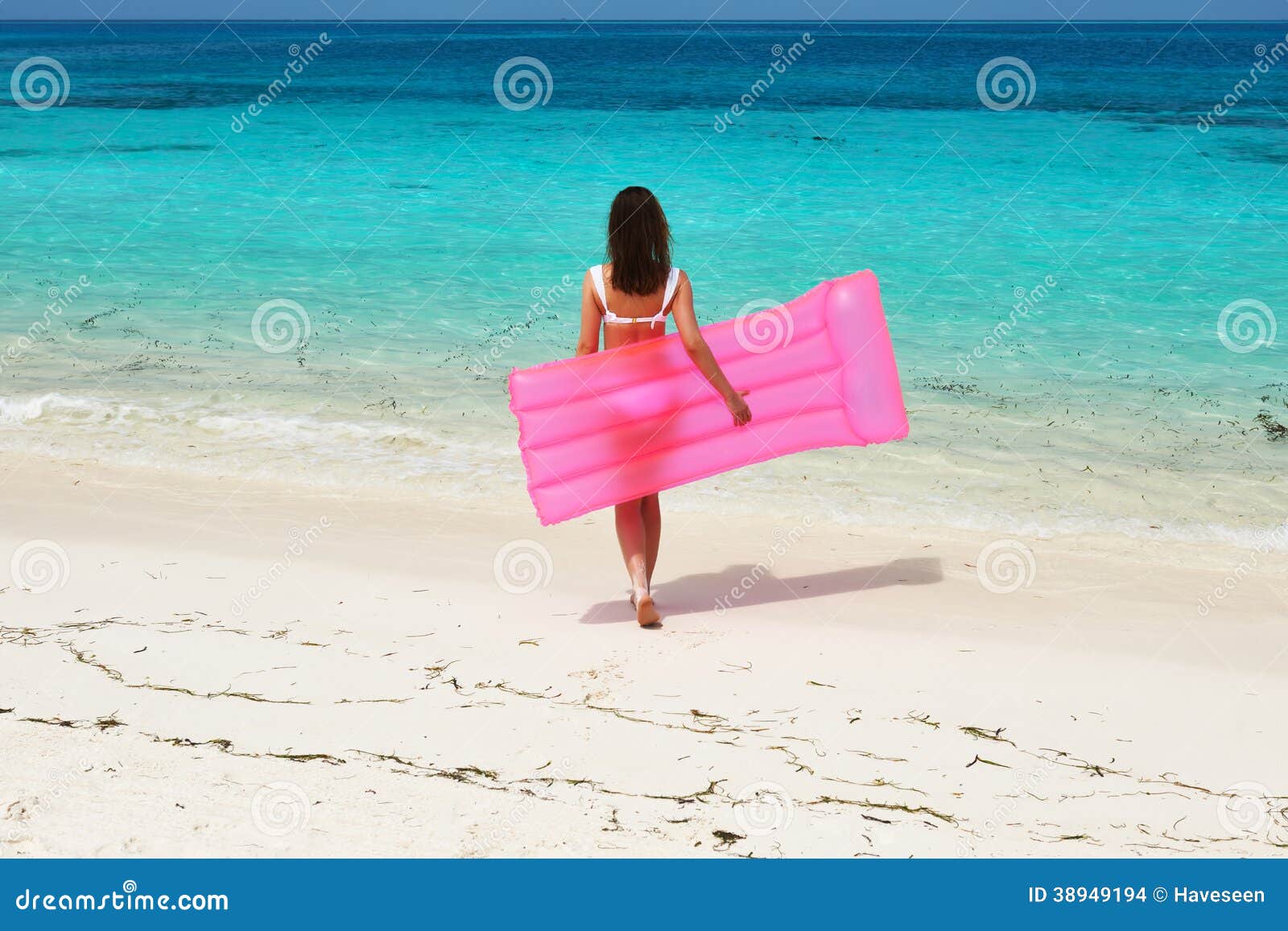 Woman with Pink Inflatable Raft at the Beach Stock Photo - Image of ...